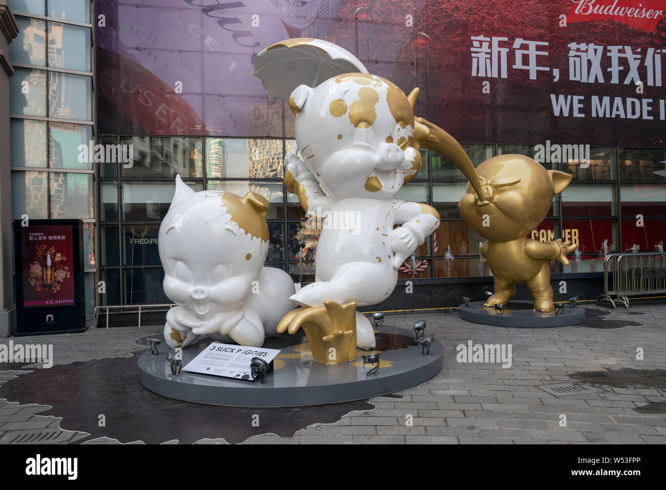 View of the "3 Slick Piggies" installation by OG Slick on display at ...