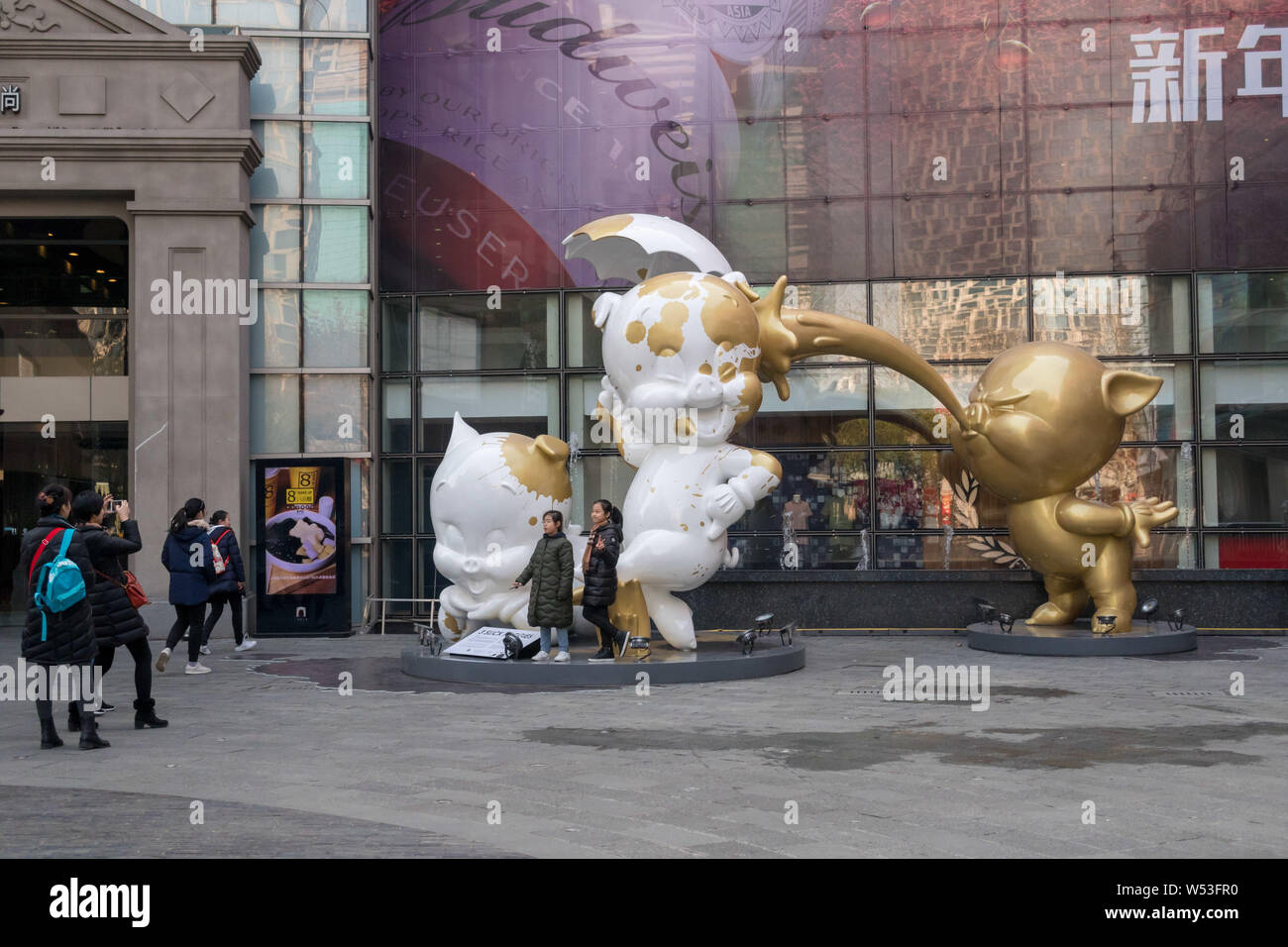 View of the "3 Slick Piggies" installation by OG Slick on display at ...