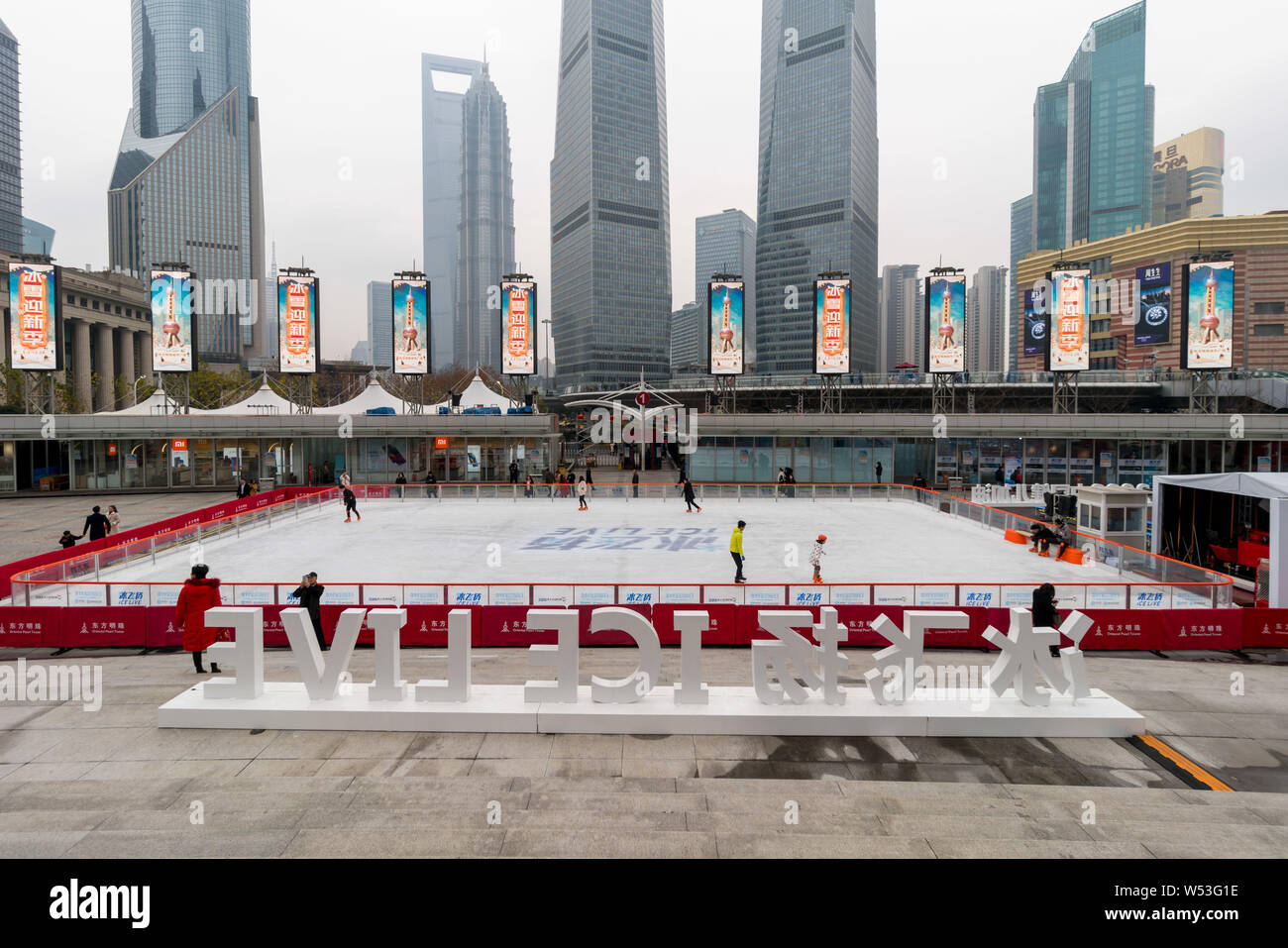 Chinese children and enthusiasts enjoy ice skating on a 600-square ...
