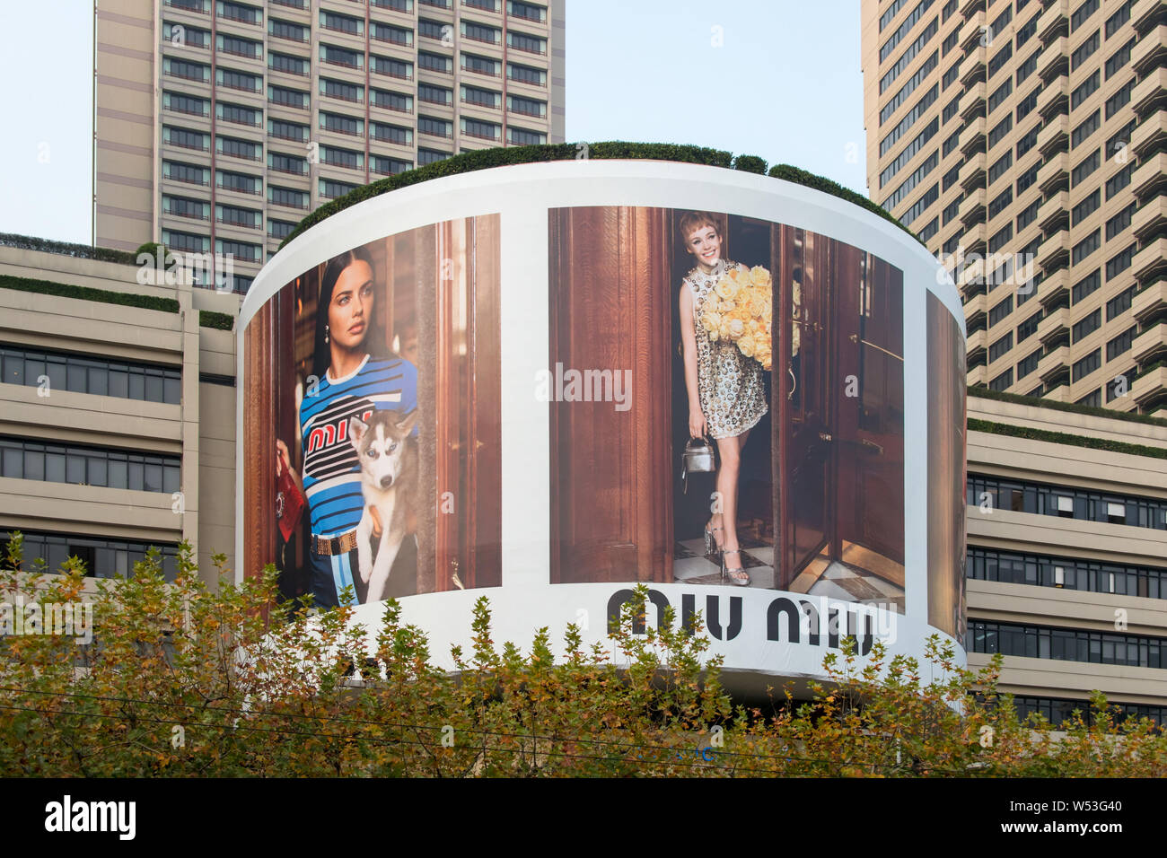 --FILE--View of an advertisement for Miu Miu at a shopping mall in ...