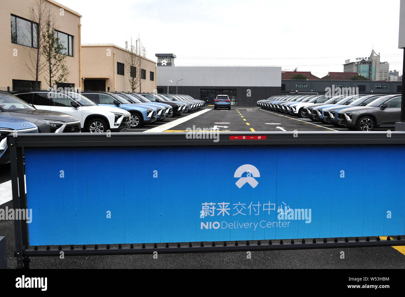--FILE--Electric cars are lined up at the NIO Delivery Center in ...