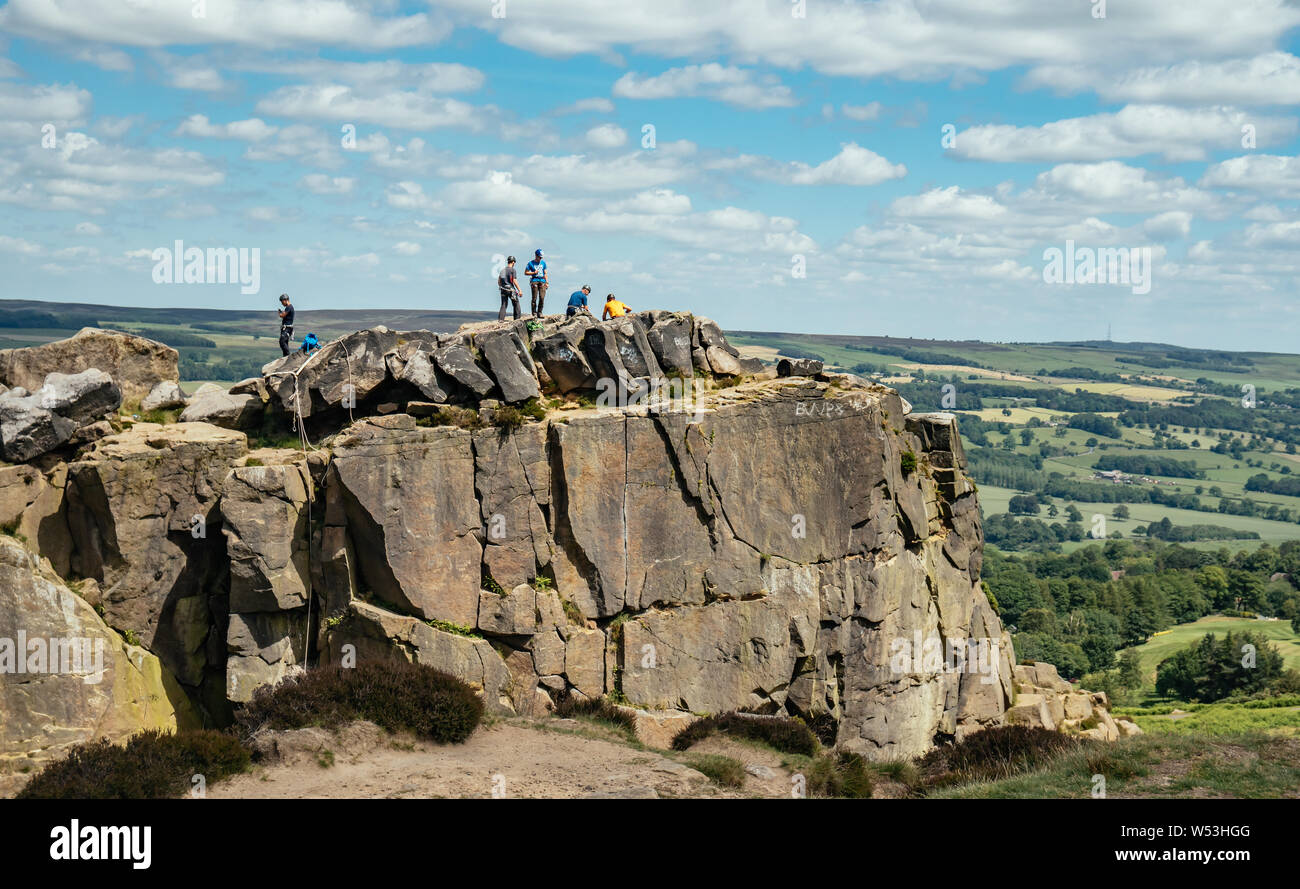 Climbers and Abseilers at the Ilkley Moor Cow and Calf Rocks in ...