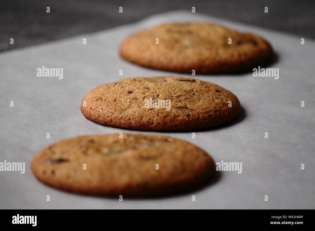 cookies with milk dark grey moody Stock Photo - Alamy