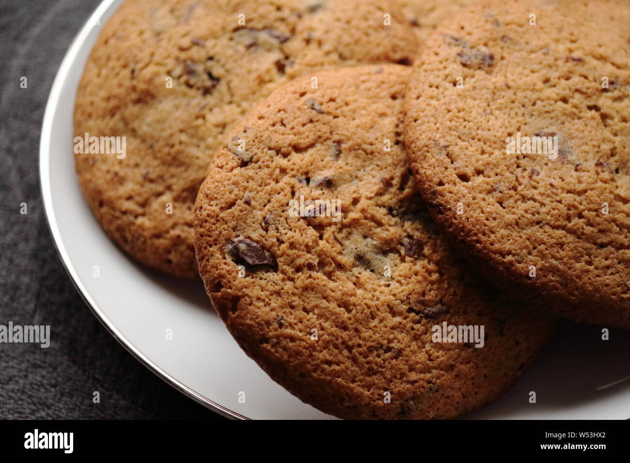 cookies with milk dark grey moody Stock Photo - Alamy