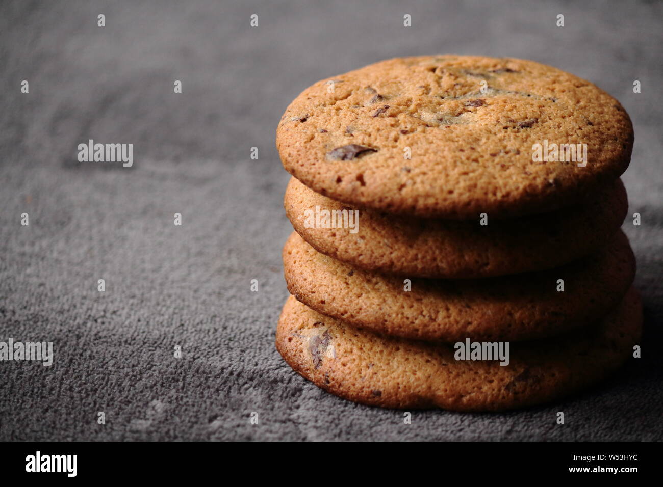 cookies with milk dark grey moody Stock Photo - Alamy