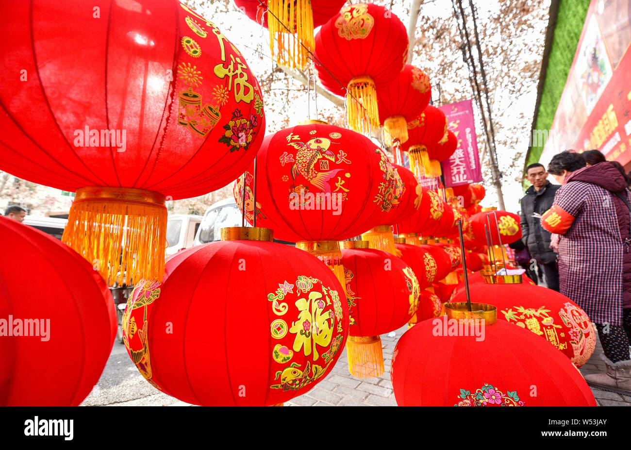 Local Chinese residents shop for red lanterns, decals and other ...