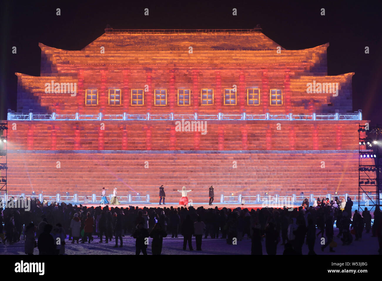 Russian models perform in front of a giant ice sculpture at the 20th ...