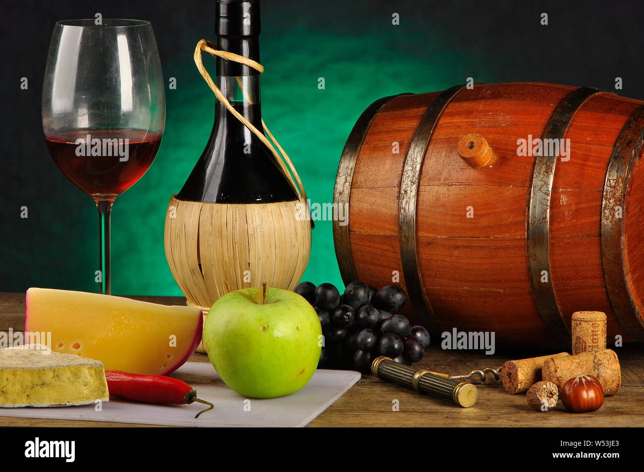 Red wine, cheese and wooden barrel Stock Photo - Alamy