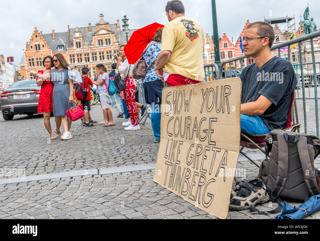 Wouter Mouton, a climate change activist with his carboard placards in ...