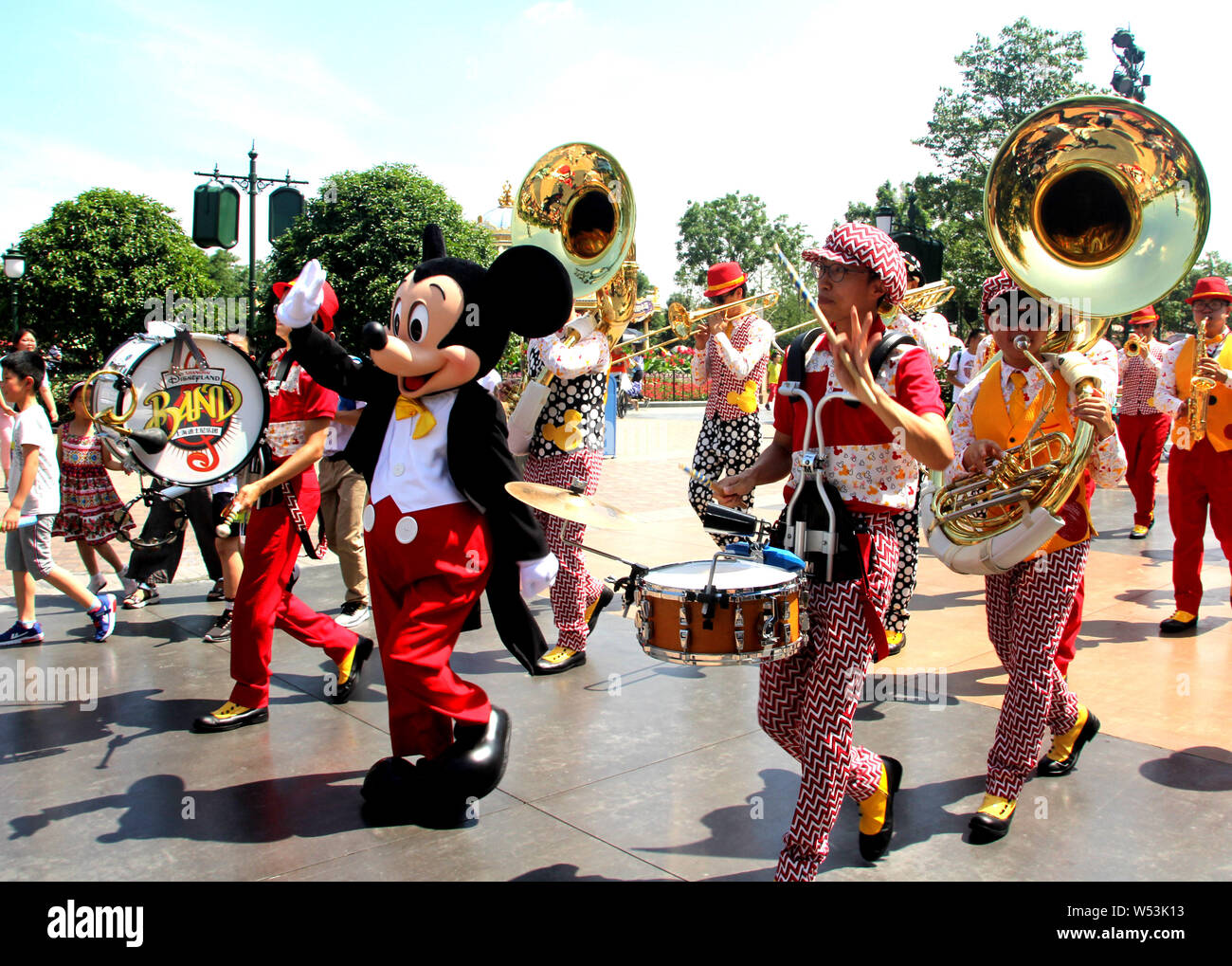--FILE--An entertainer dressed in a Mickey Mouse costume performs ...