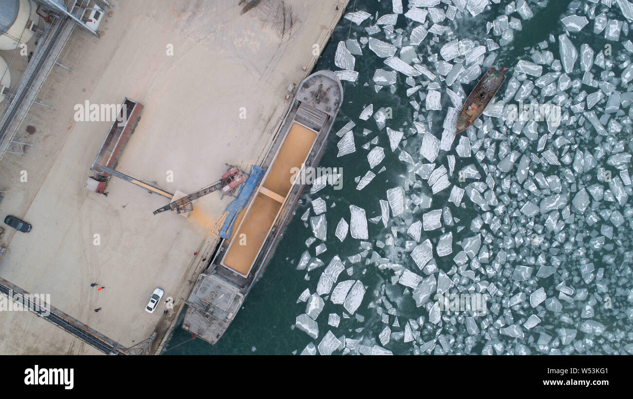 Aerial view of thick sea ice on the frozen sea surface at Laizhou Bay ...