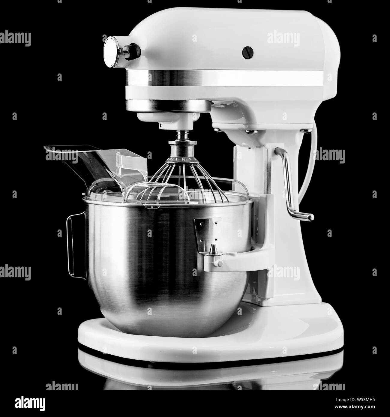 White kitchen mixer isolated on a black background Stock Photo - Alamy