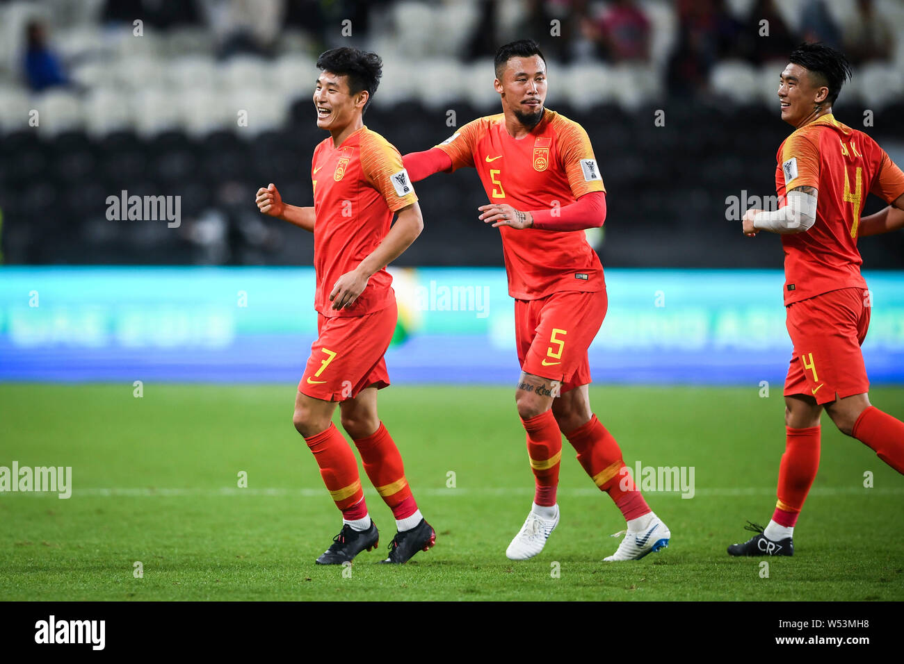 Wu Lei, left, and Zhang Linpeng of China celebrate after scoring ...