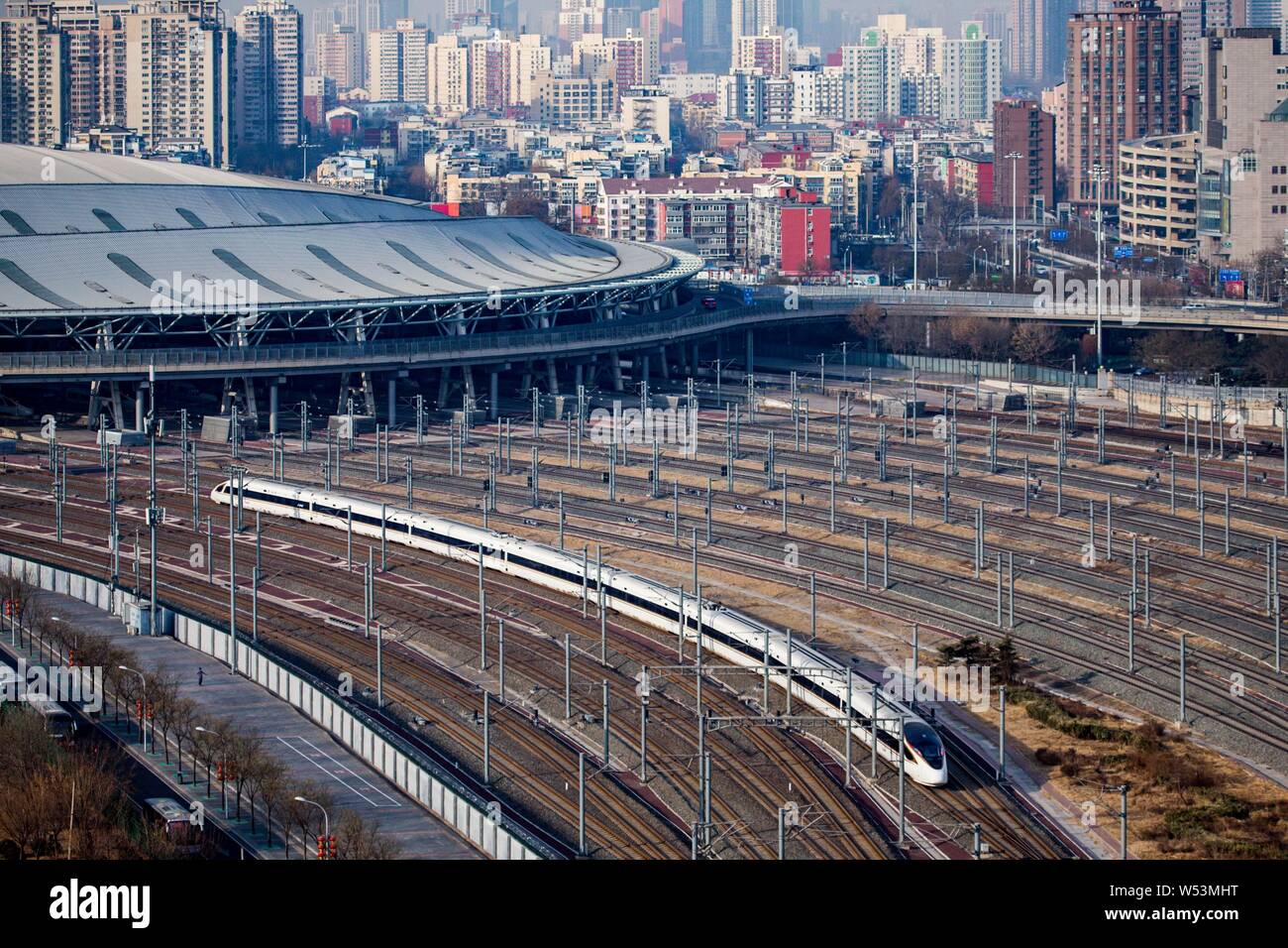 A CRH (China Railway High-speed) bullet train leaves the Beijing South railway station ahead of ...