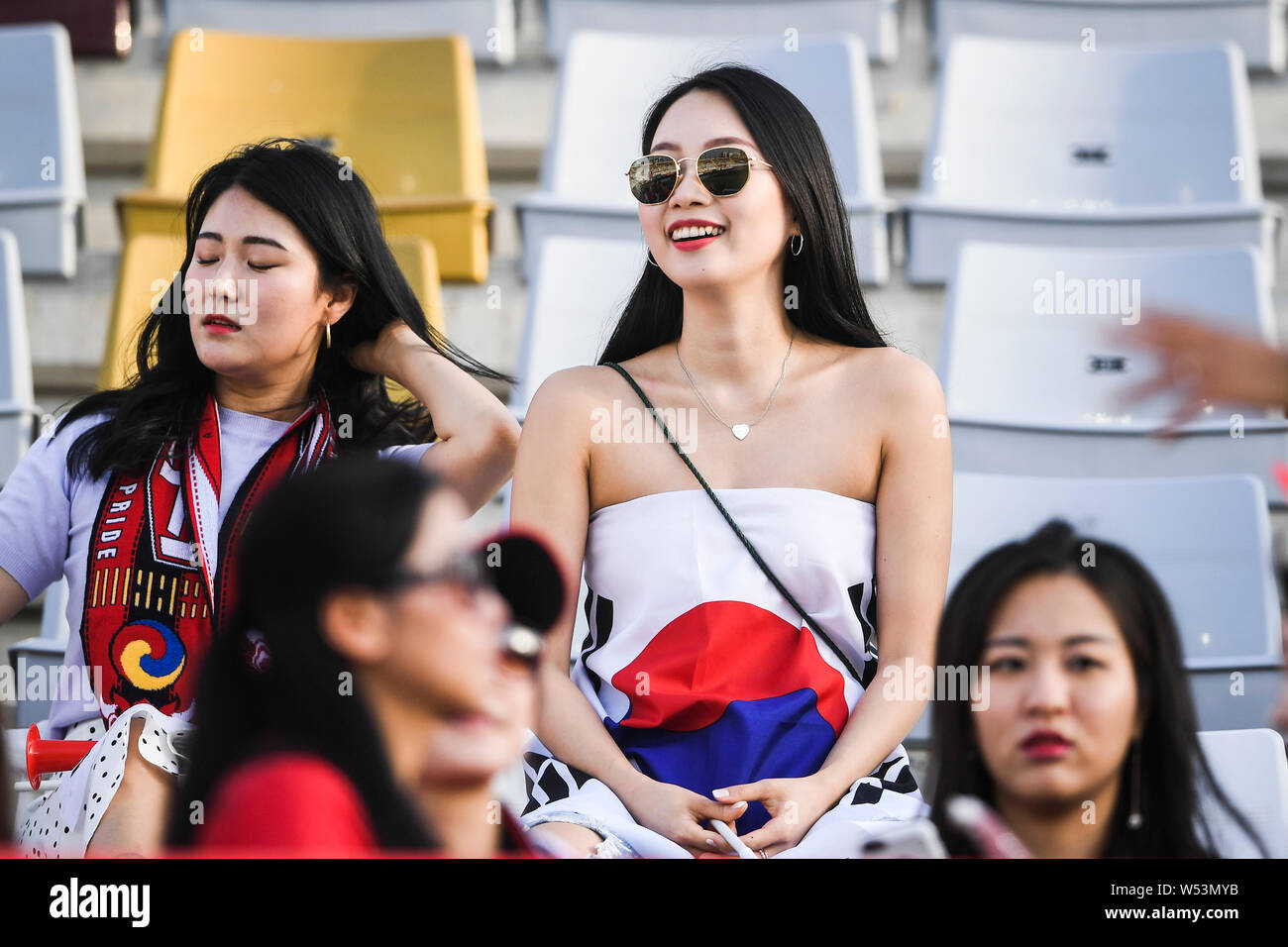A South Korean football fan wearing the national flag shows support for ...