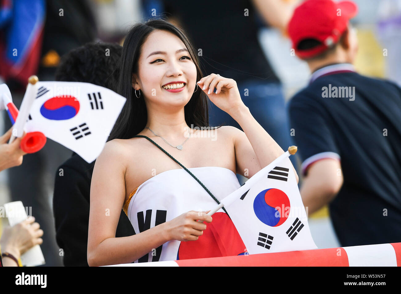A South Korean football fan wearing the national flag shows support for ...