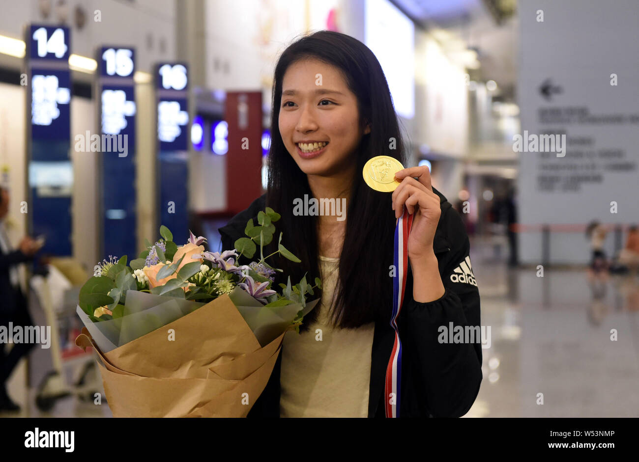 Hong Kong fencer Vivian Kong Man Wai shows her gold medal after ...