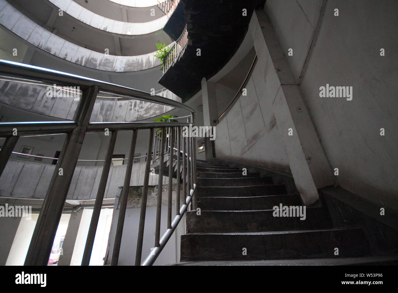 Interior view of a nine-storey cylinder building at a bus station in ...