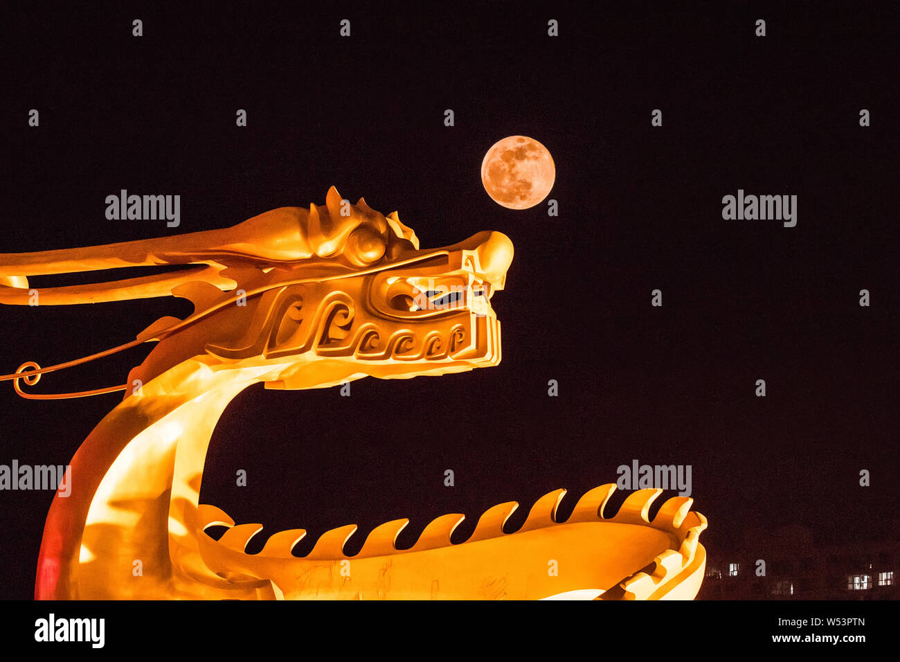 A supermoon is seen in the night sky over Beijing, China, 21 January ...