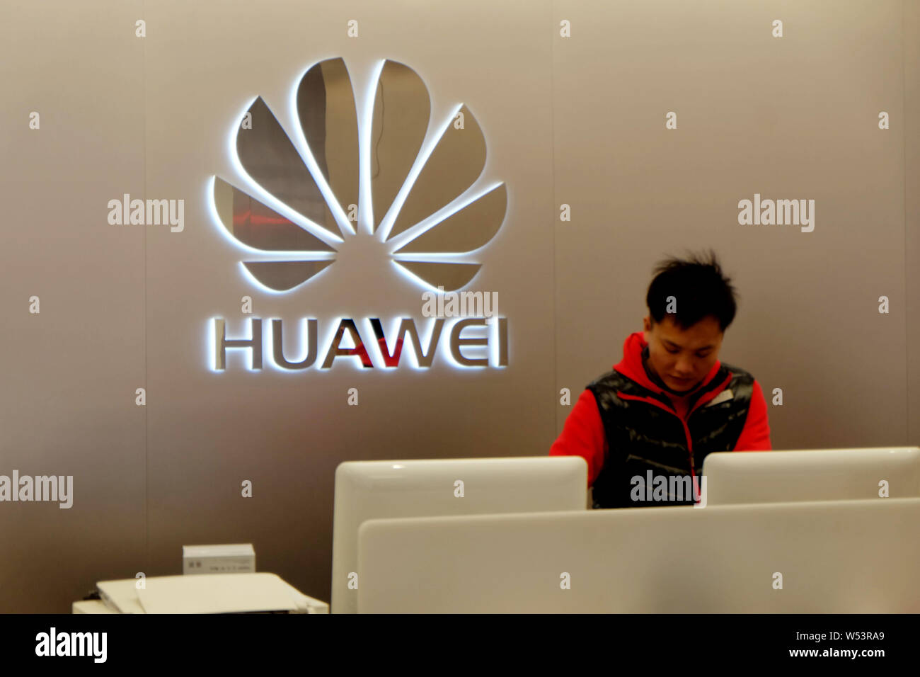 --FILE--An employee is pictured at a Huawei store in Shanghai, China ...
