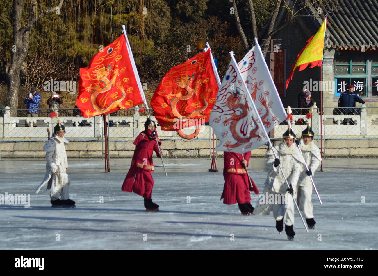 Entertainers dressed in helmets and armor in the style of Manchu ...