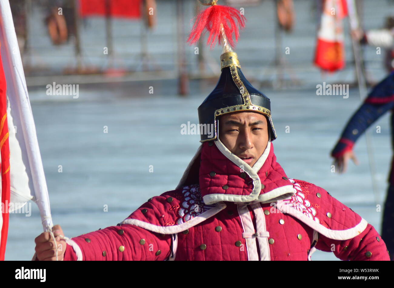 Entertainers dressed in helmets and armor in the style of Manchu ...