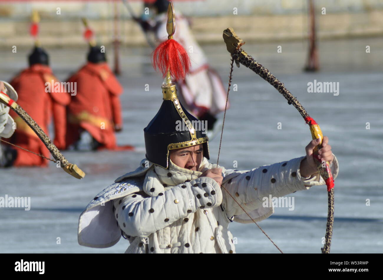 Entertainers dressed in helmets and armor in the style of Manchu ...