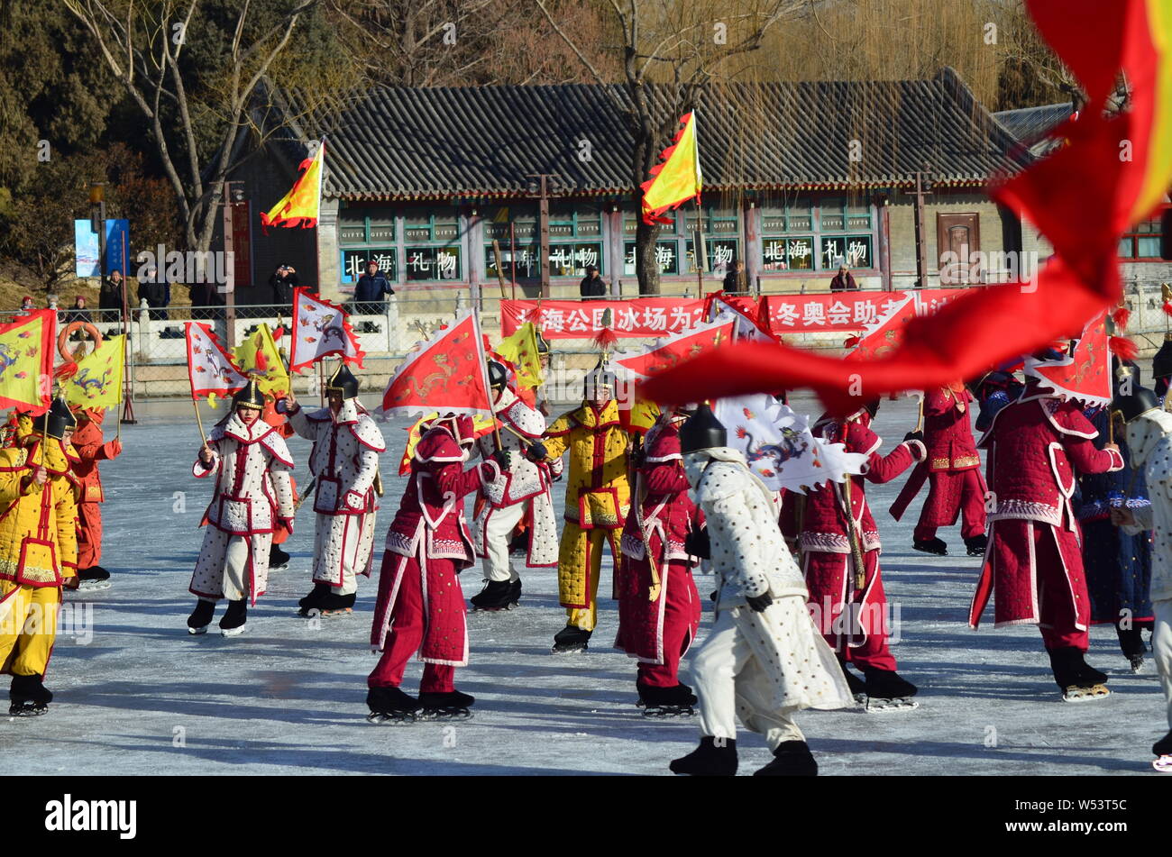 Entertainers dressed in helmets and armor in the style of Manchu ...