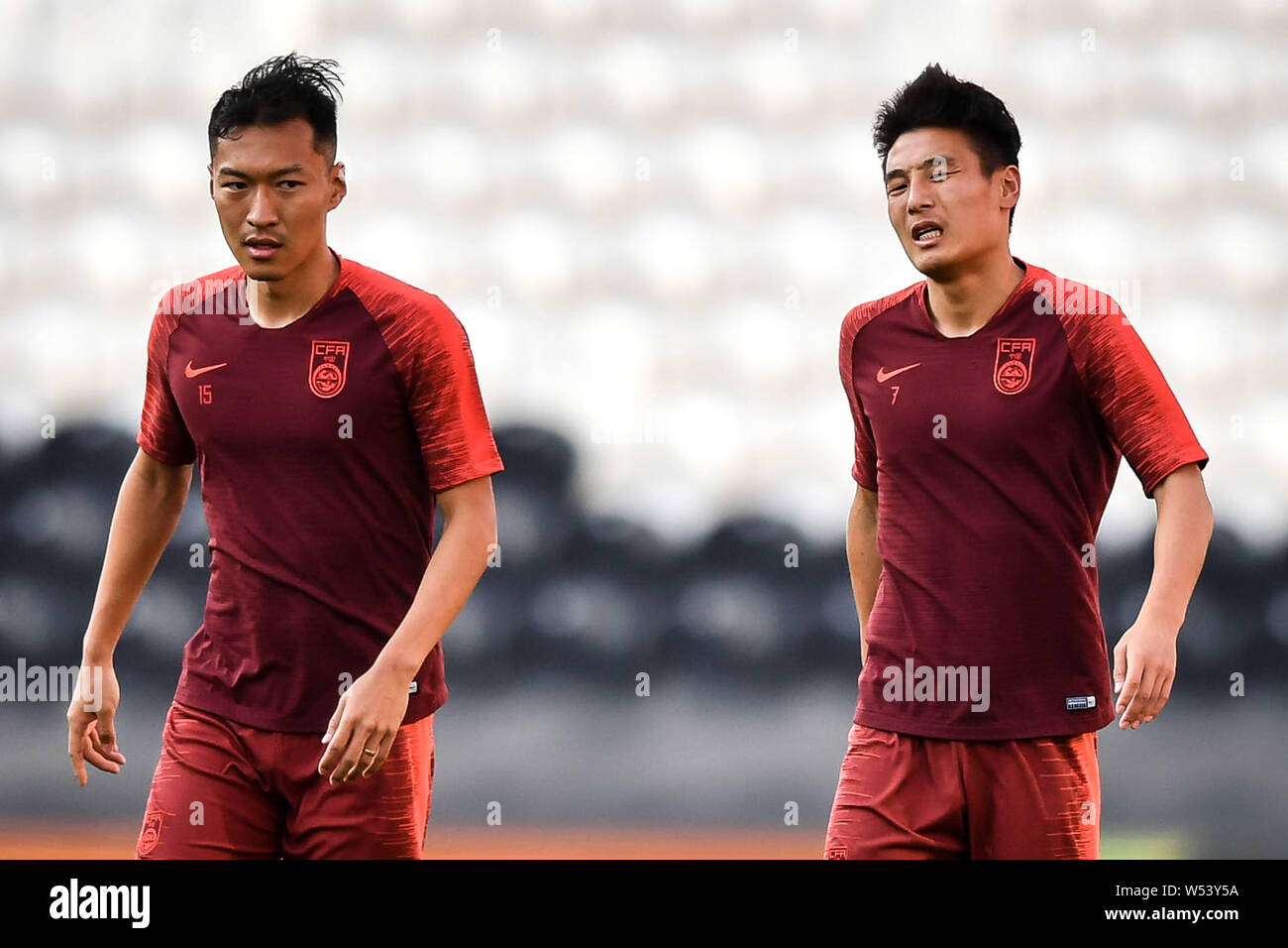 Wu Xi, left, and Wu Lei of the Chinese national men's football team ...