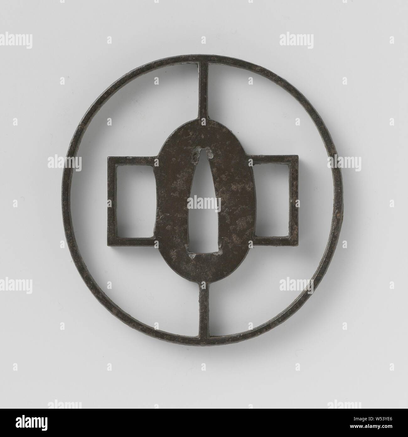 Hand guard, Oval tsuba with a simple openwork decoration of a vertical ...