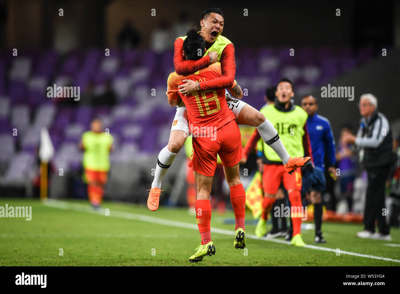 Gao Lin, below, and Wang Dalei of China celebrate after scoring a goal ...