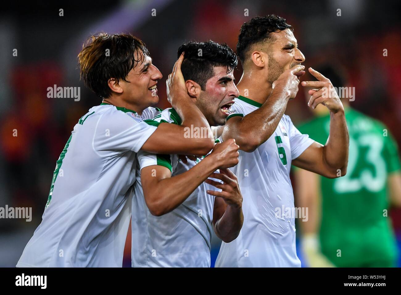 Players of Iraq national football team celebrate after scoring against ...