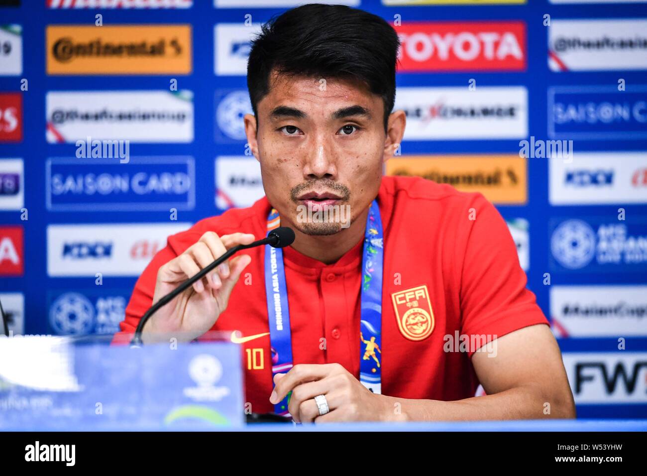 Zheng Zhi of Chinese national men's football team attends a press conference before the AFC ...