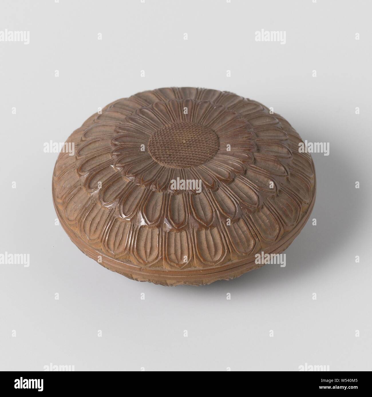 Netsuke, Depiction of two, spine connected, flowers with two holes for ...