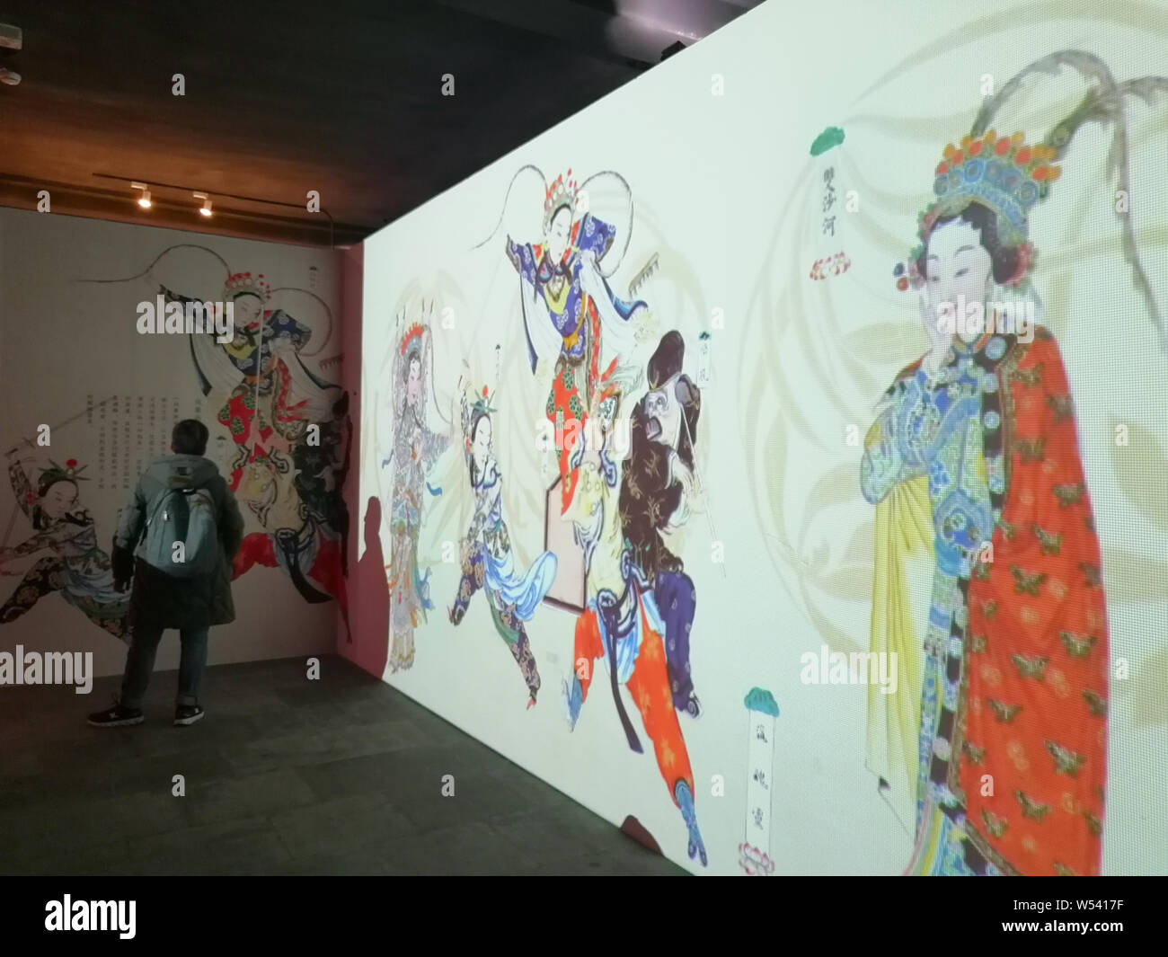 People visit the immersive digital experience exhibition at the Palace ...