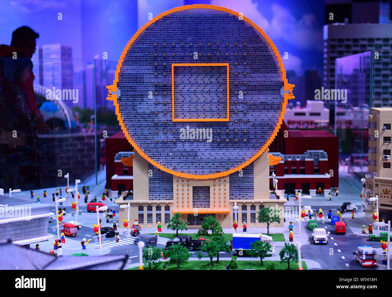 The Coin-shaped Fang Yuan Building made by Lego bricks is on display at ...
