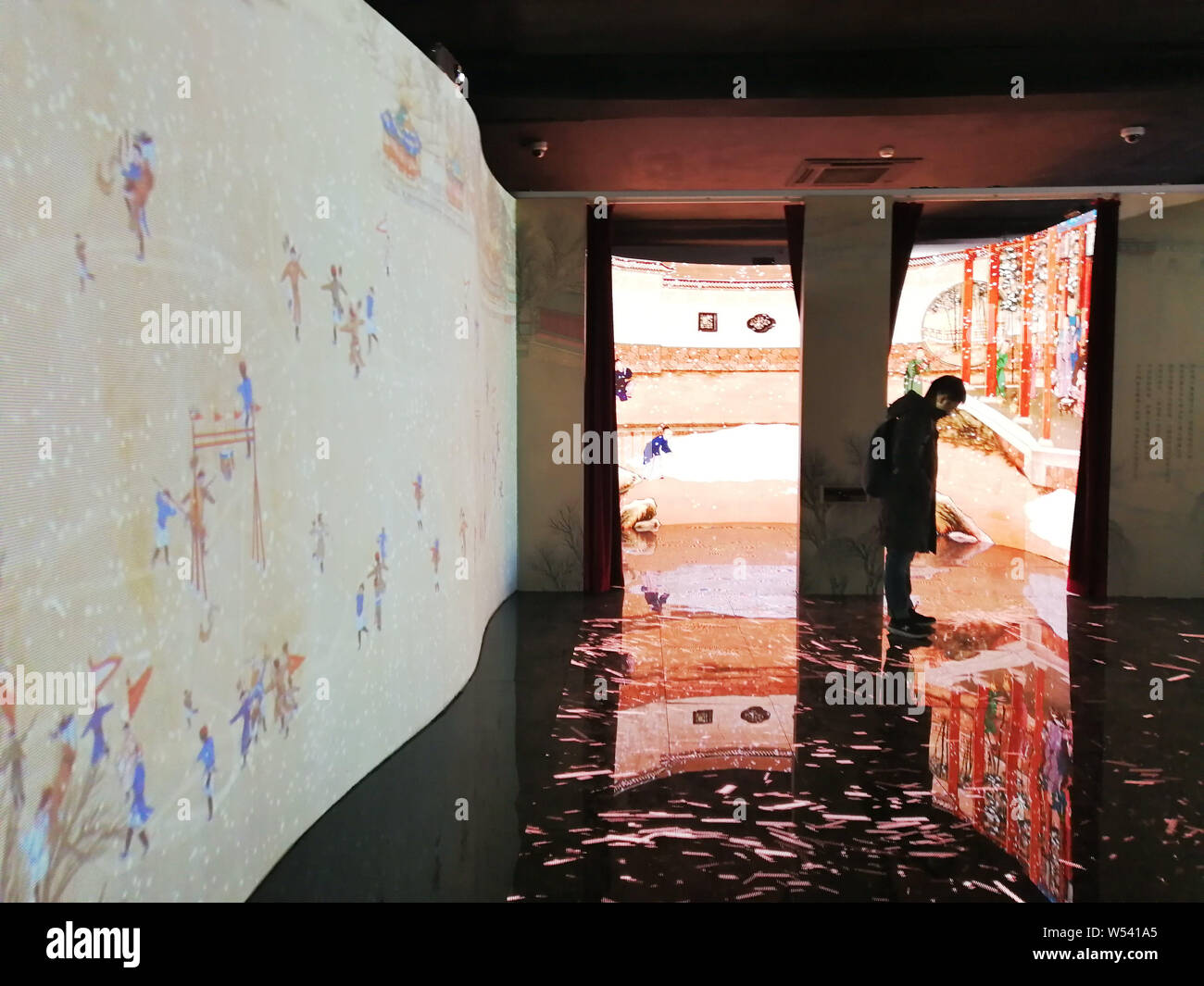 People visit the immersive digital experience exhibition at the Palace ...