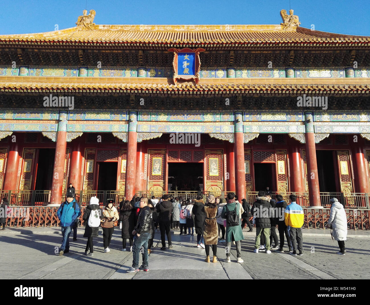 Tourists visit the Hall of Supreme Harmony (Taihe dian) during the ...