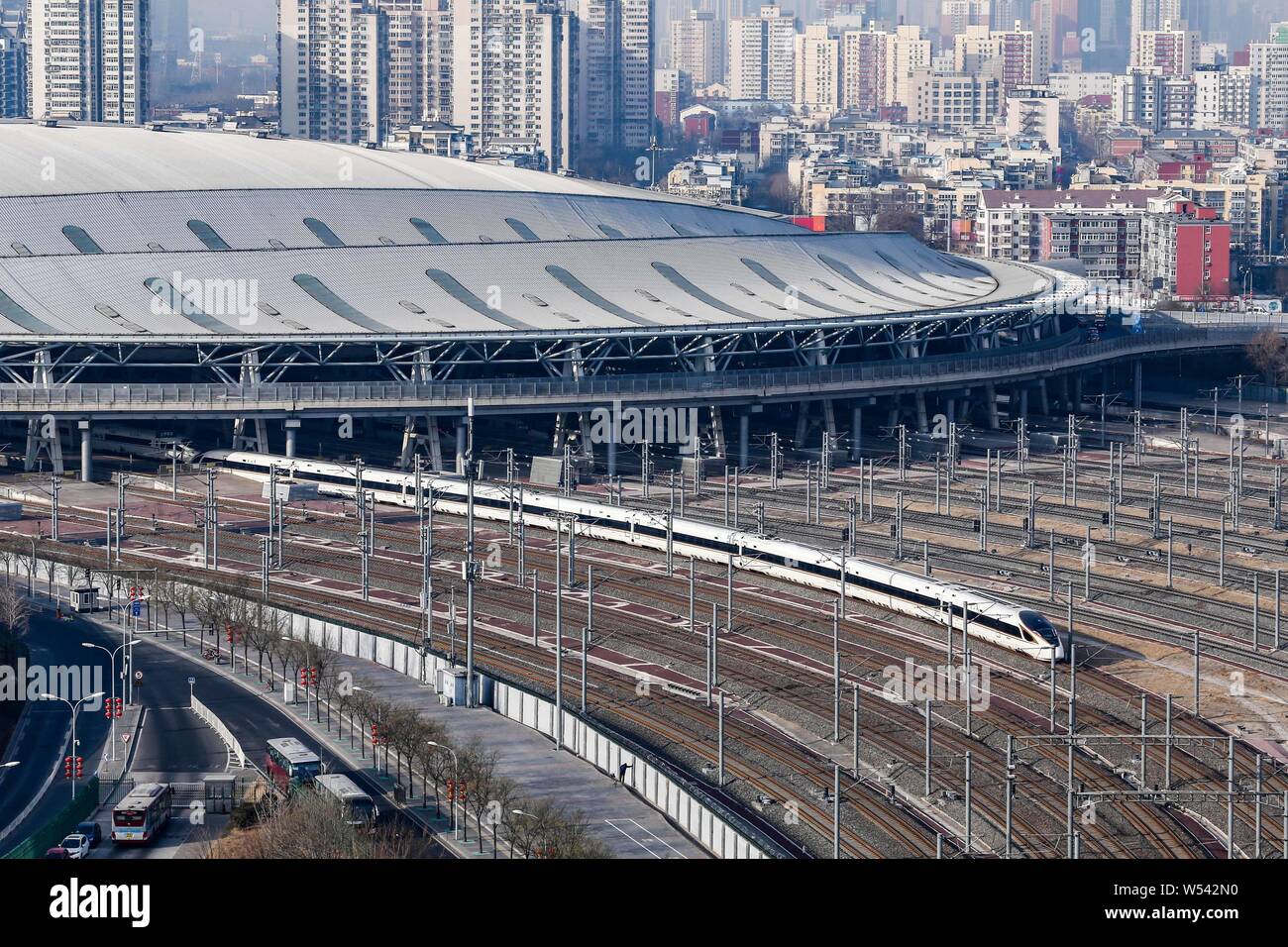 A CRH (China Railway High-speed) bullet train leaves the Beijing South ...