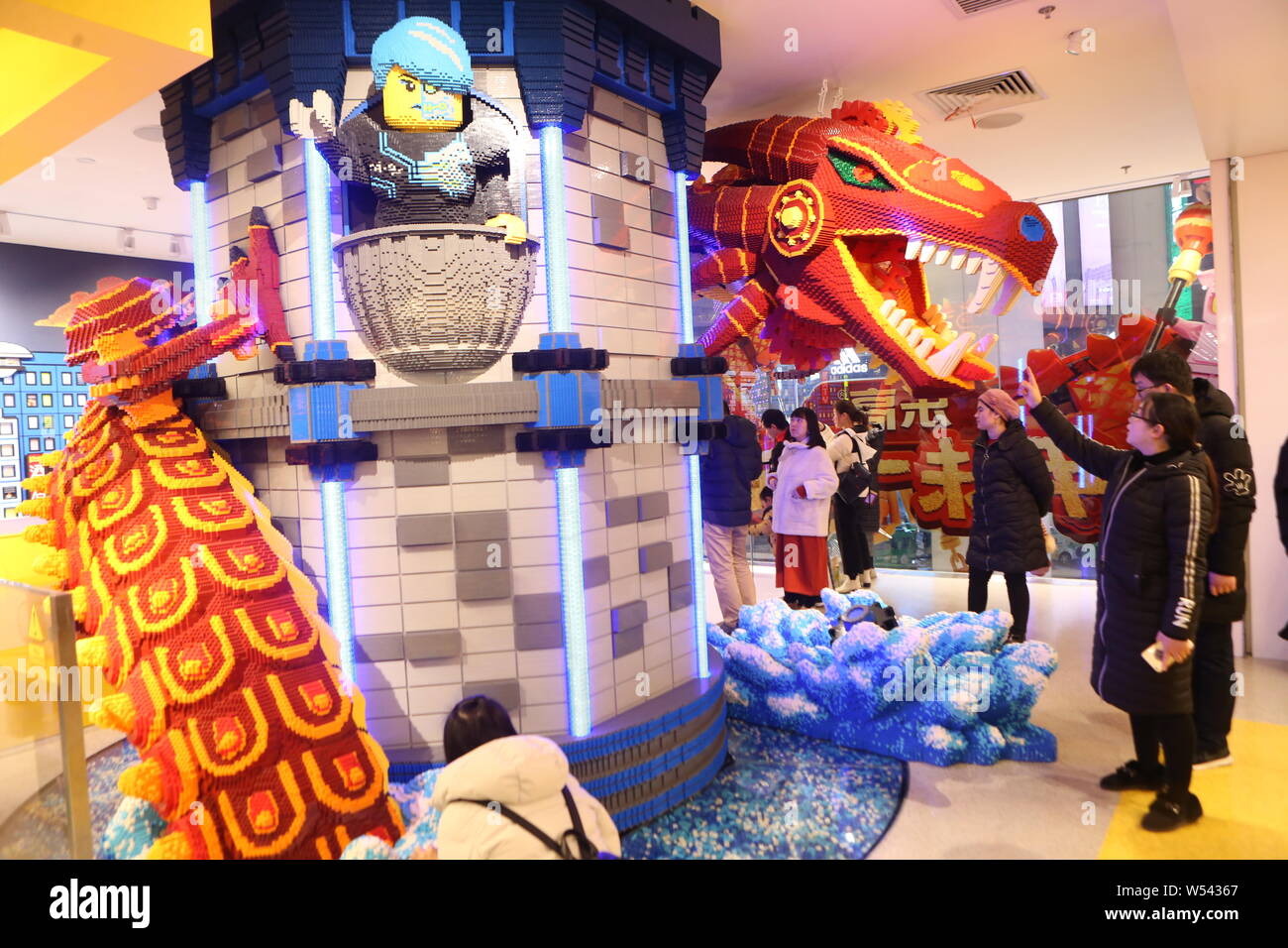 A model of a Chinese dragon spiralling up a pillar, constructed with ...