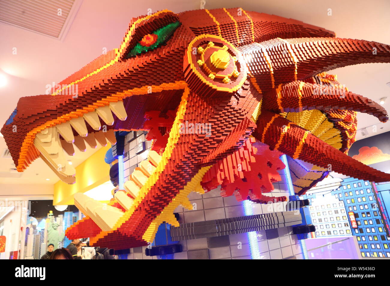A model of a Chinese dragon spiralling up a pillar, constructed with ...