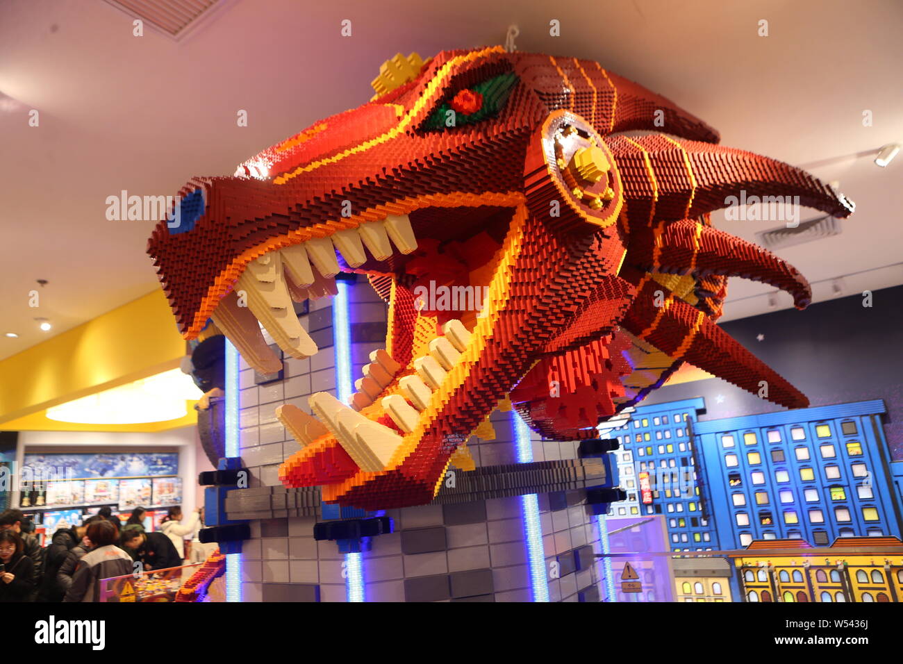 A model of a Chinese dragon spiralling up a pillar, constructed with ...