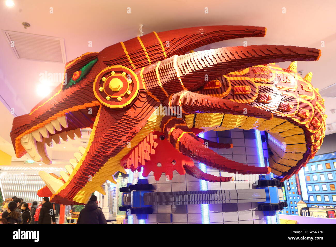 A model of a Chinese dragon spiralling up a pillar, constructed with ...