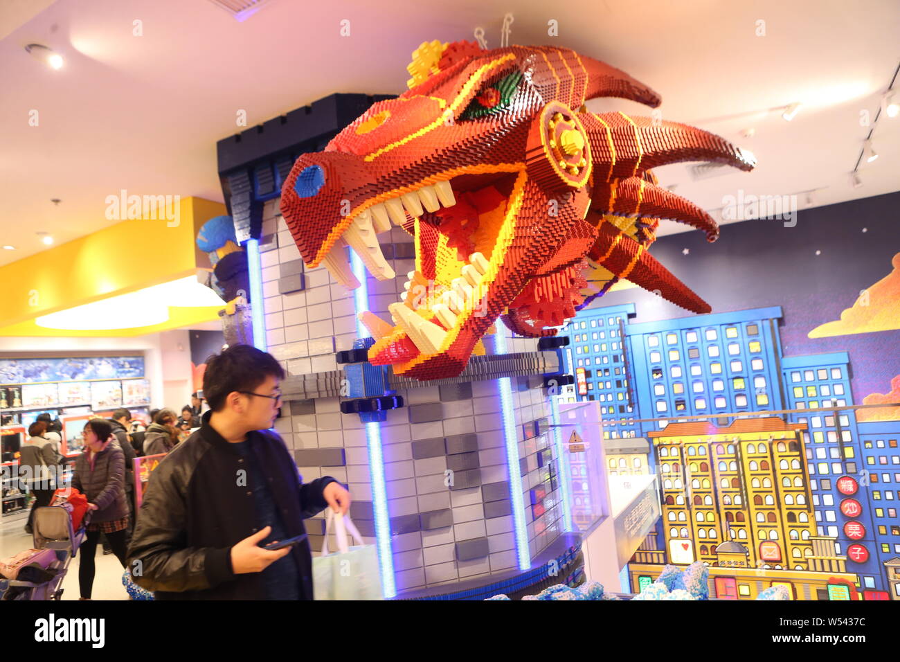 A model of a Chinese dragon spiralling up a pillar, constructed with ...