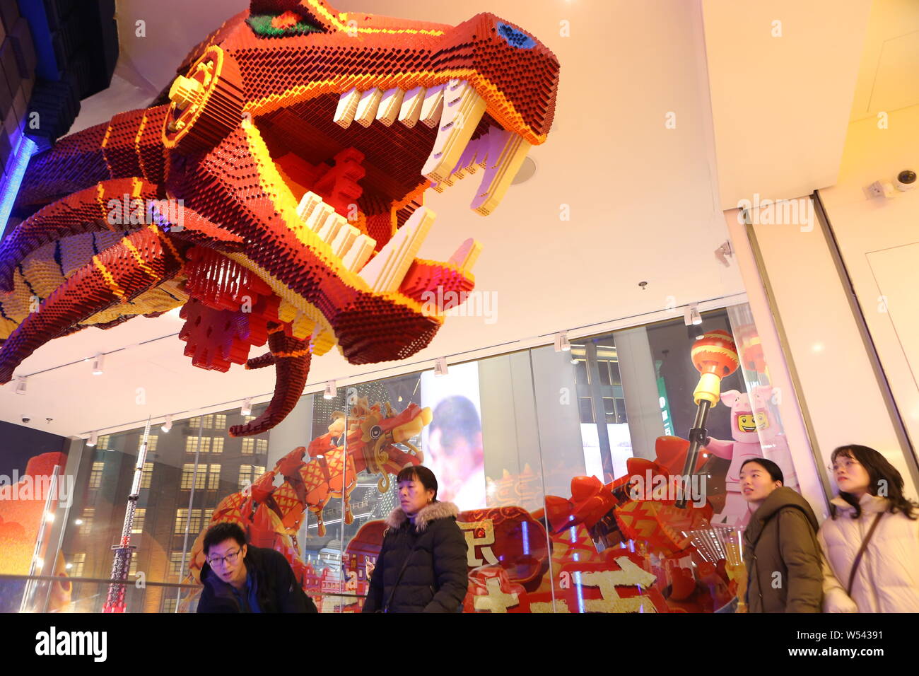 A model of a Chinese dragon spiralling up a pillar, constructed with ...