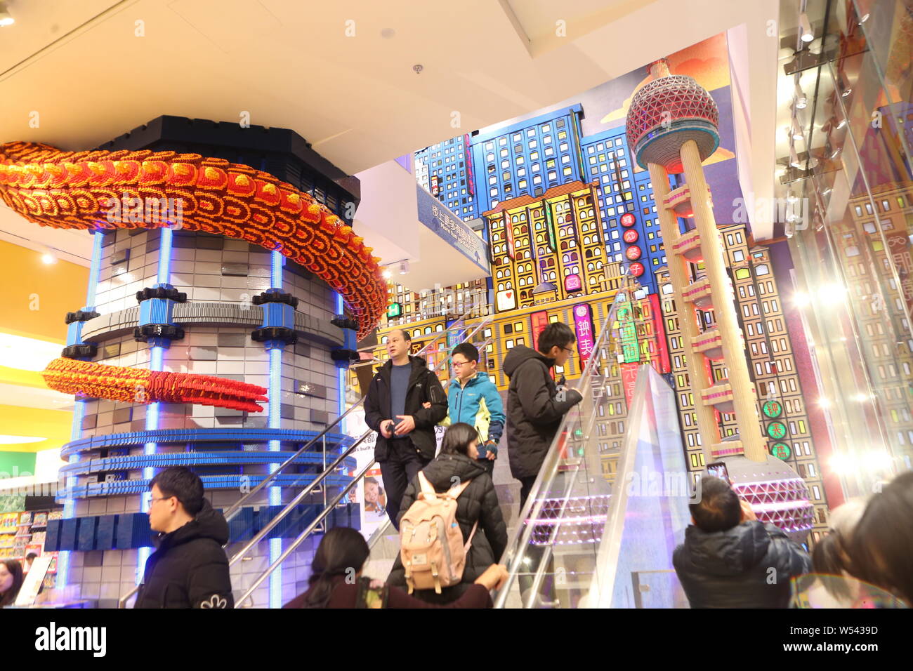 A model of a Chinese dragon spiralling up a pillar, constructed with ...