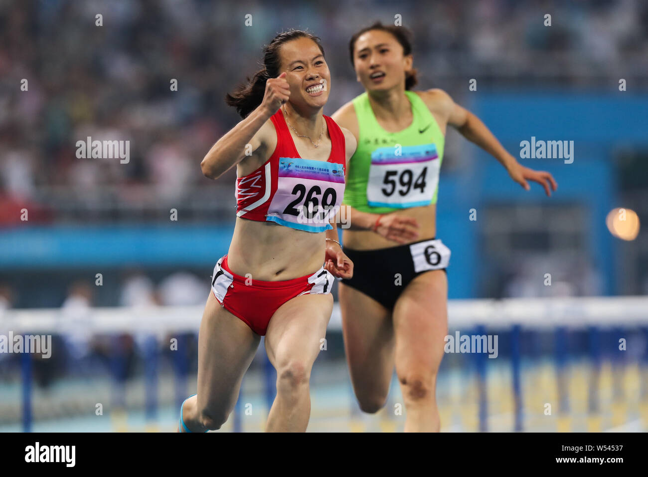 --FILE--Wu Shuijiao of China competes in the women's 100m hurdles final ...