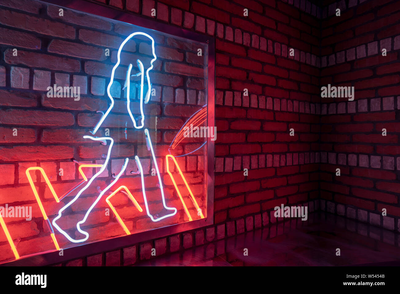 Walking Man made from Neon Lights Stock Photo - Alamy
