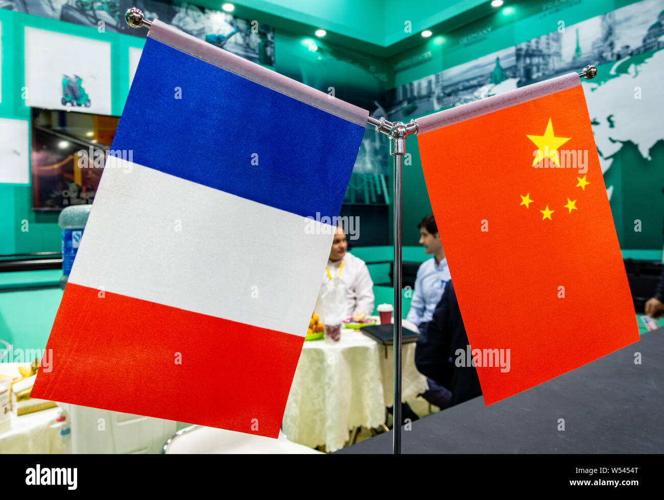 --FILE--National flags of China and France are displayed during an expo ...