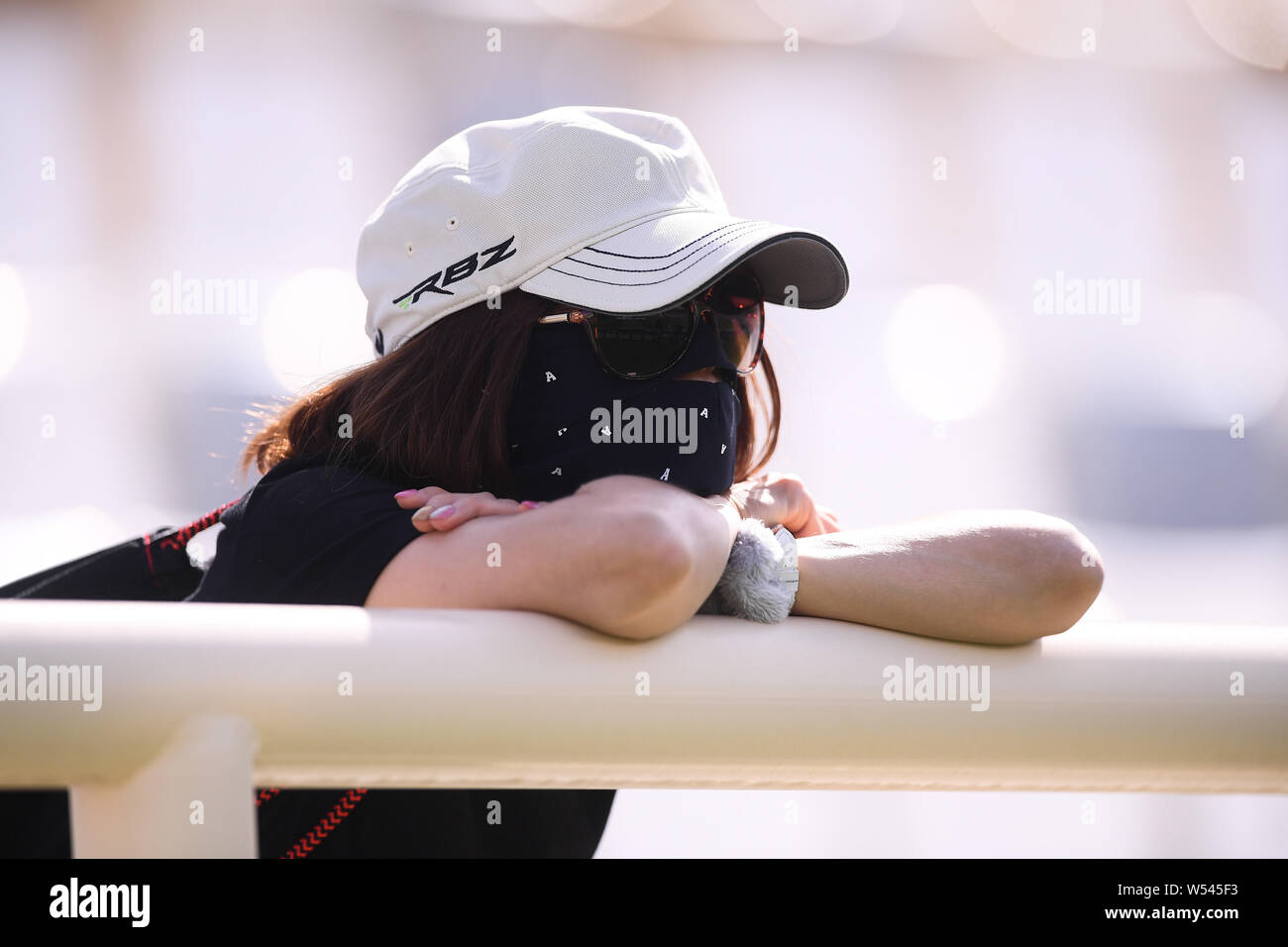Japanese football fans wave their national flags to show support for ...